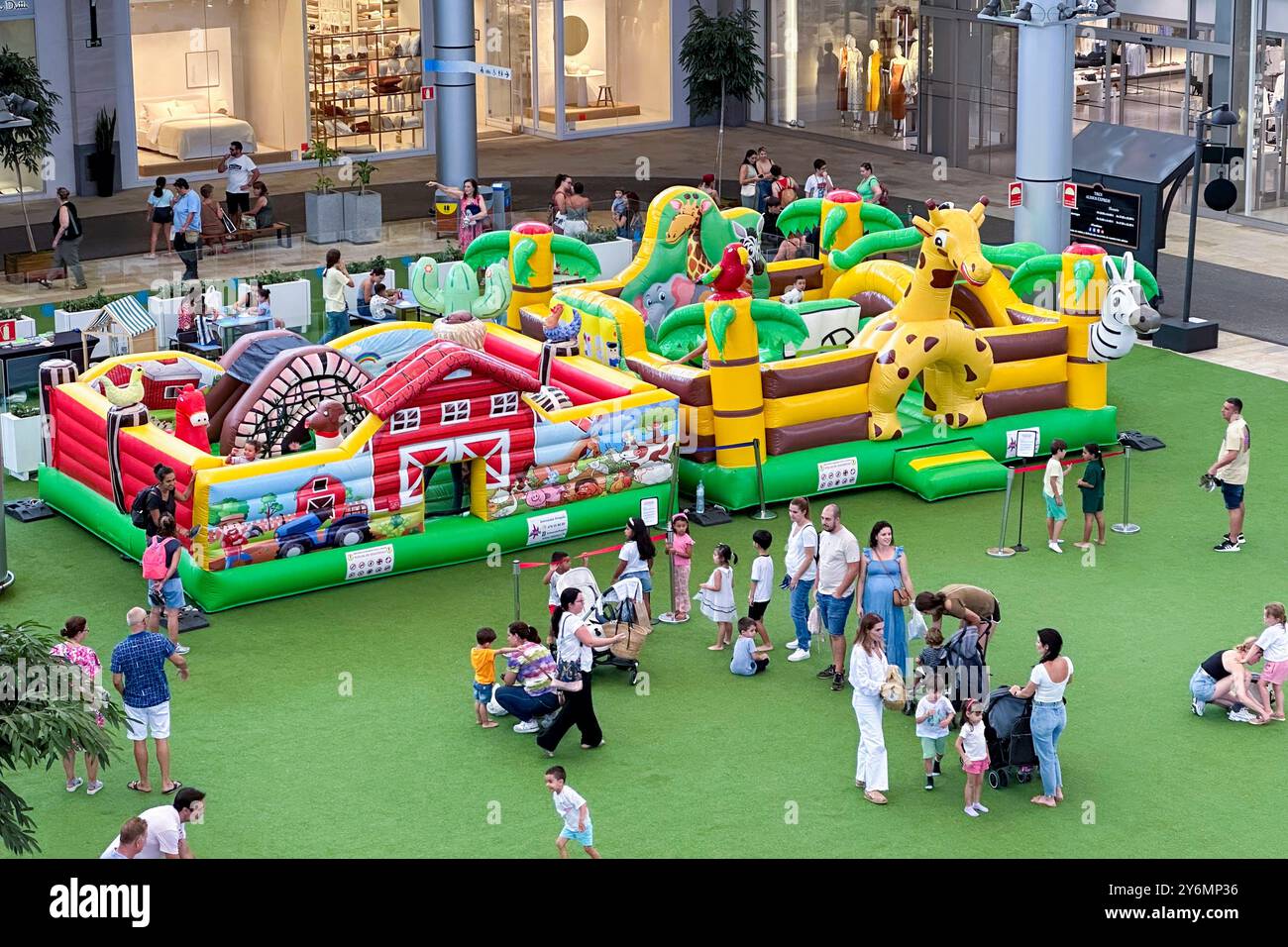 Inflatable game for children in a shopping mall in Spain Stock Photo ...