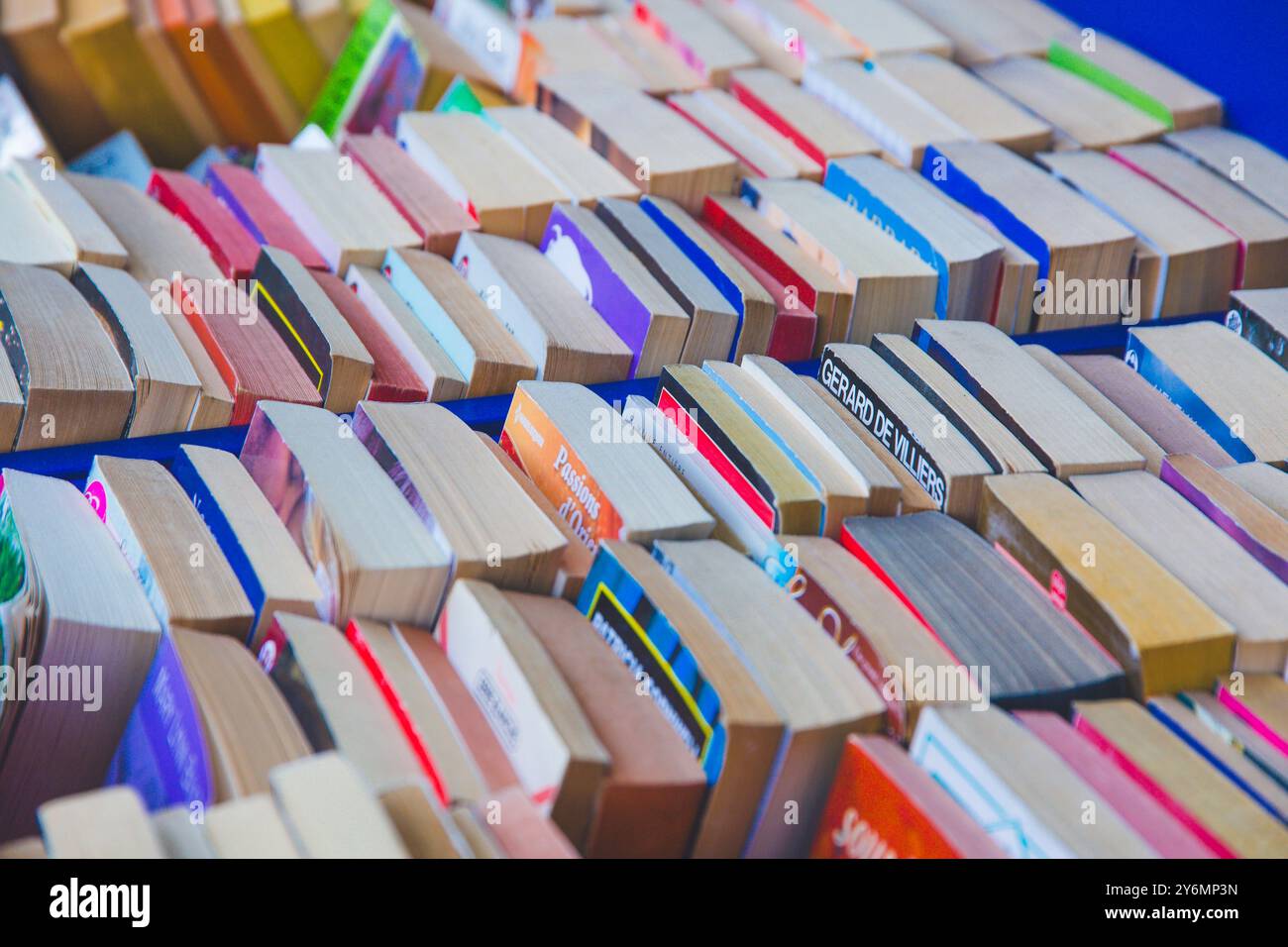 Used books stored in a bin Stock Photo - Alamy
