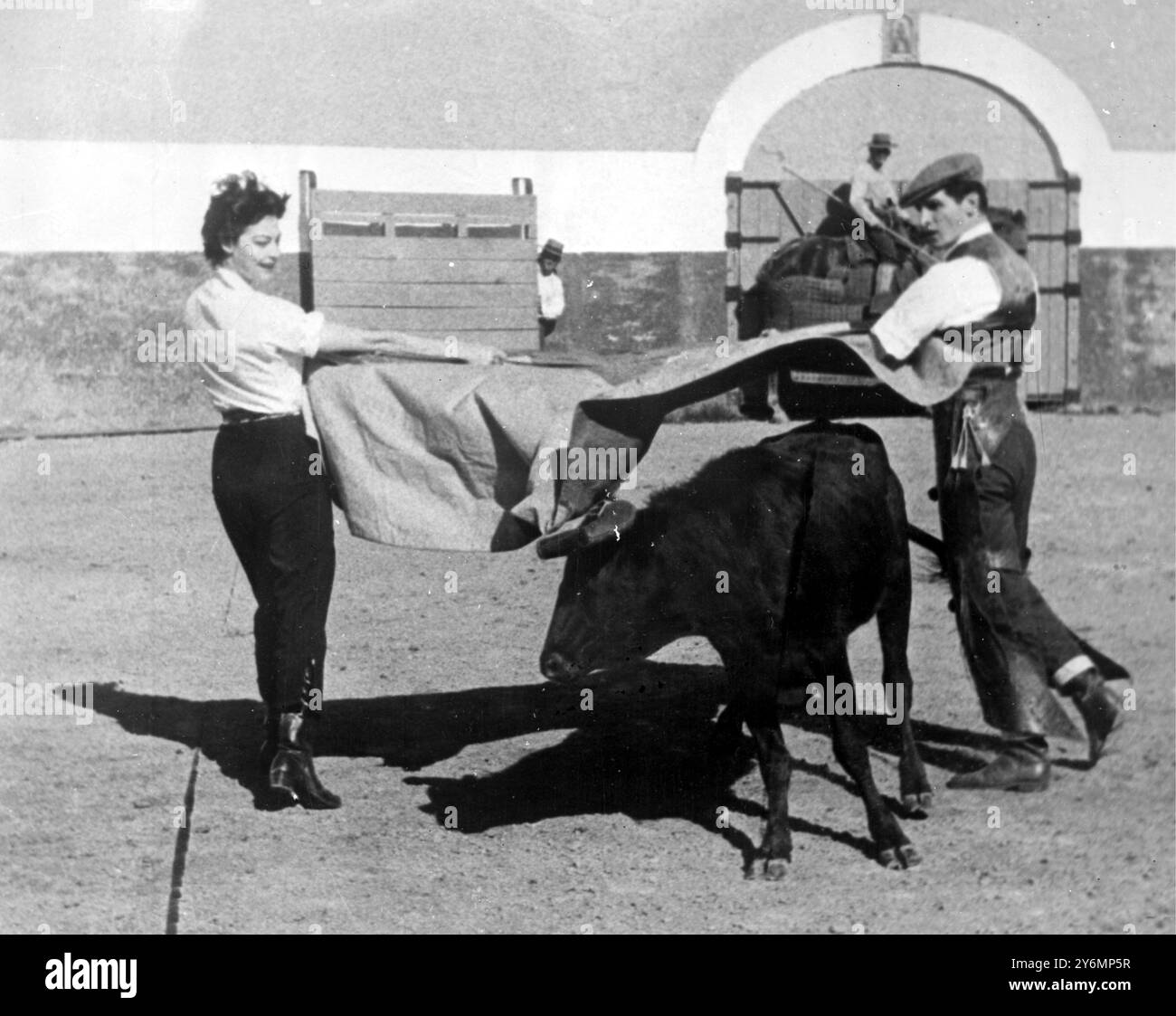Madrid, Spain : Hollywood star Ava Gardner shares of cloak with Spanish ...