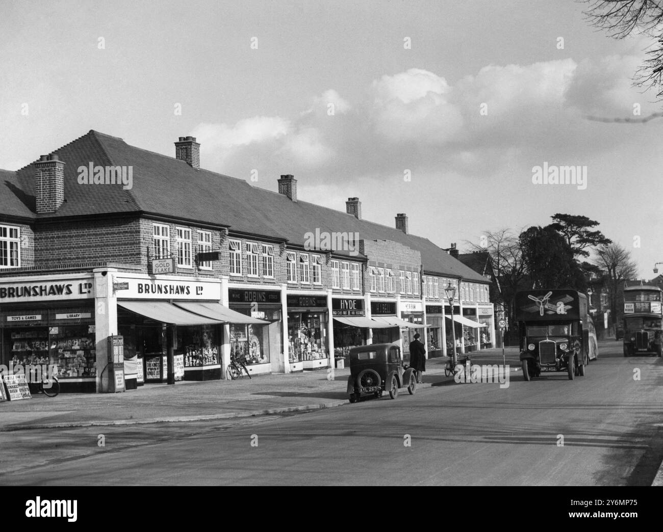A parade of shops. 1950's Stock Photo - Alamy