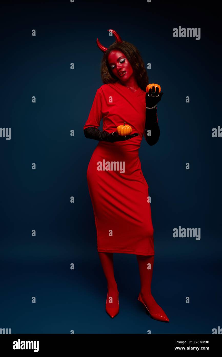 This woman embraces Halloween, wearing a bold costume and playfully ...