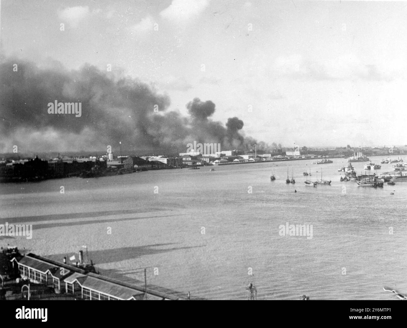 Pall of smoke hanging over the city as raging fire swept the Yan ...