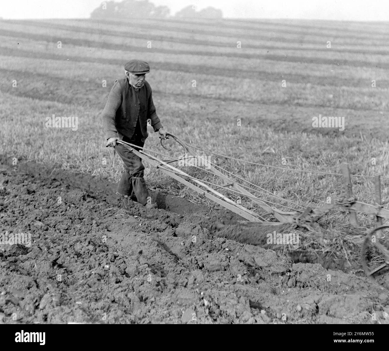 ploughing match at nonesuch farm, Ewell. An old style Ploughman ...