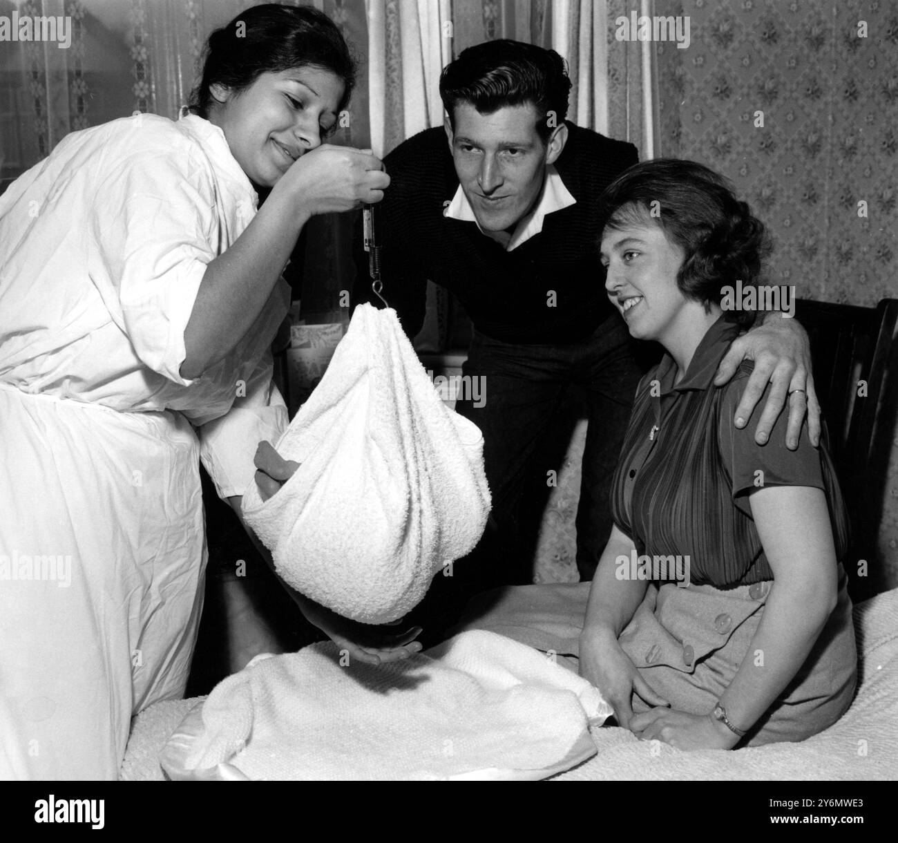 Midwife baby Black and White Stock Photos & Images - Alamy