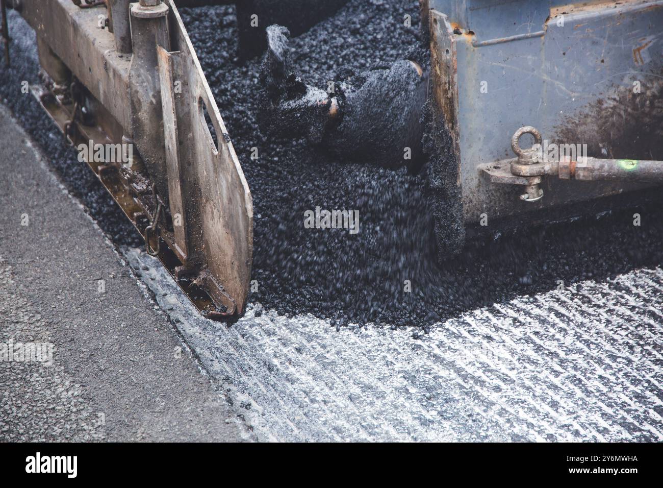 Laying asphalt on a freeway Stock Photo - Alamy