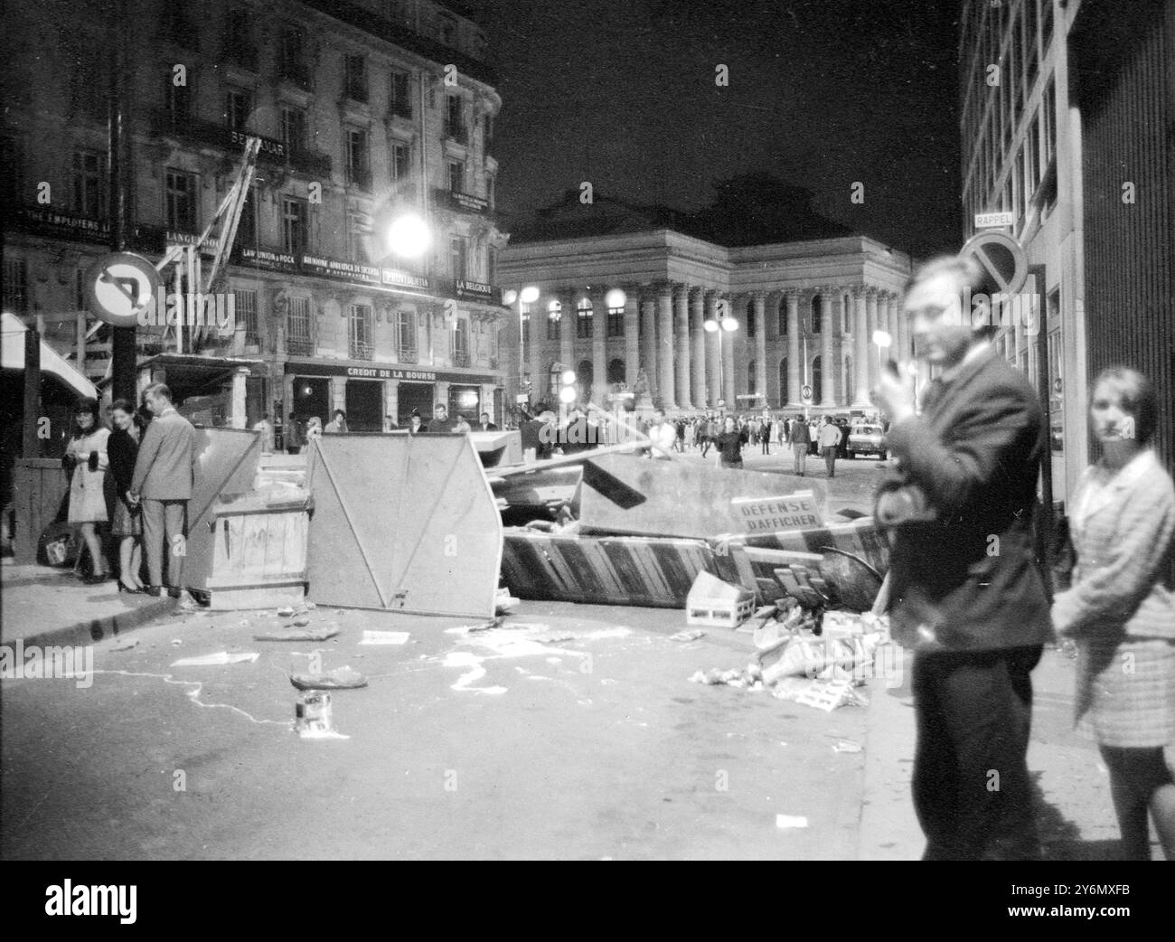 Paris: A barricaded street in front of the Bourse (seen background ...