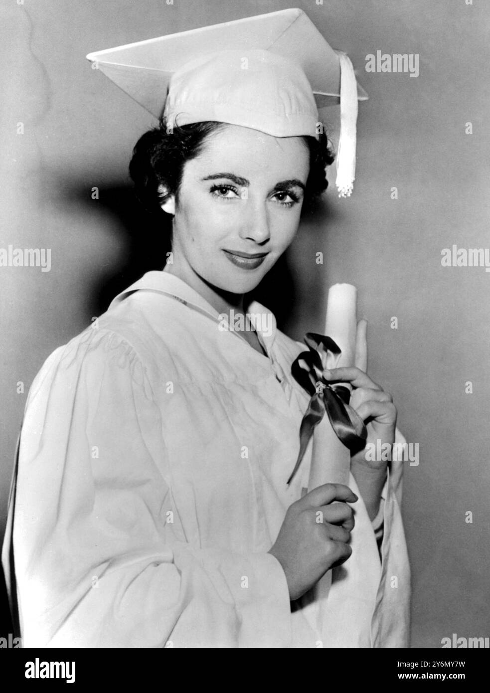 Elizabeth Taylor in cap and gown 1950 She attended school on the MGM ...