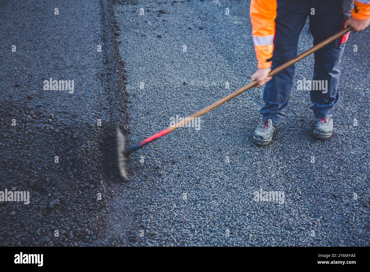 Bitumen road repair site Stock Photo - Alamy