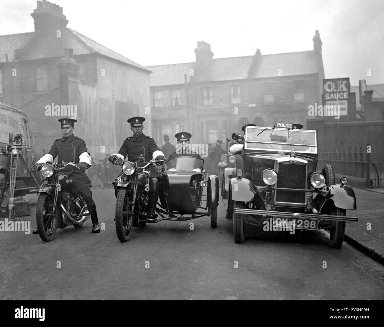 London. Mobile Police Force. A motor car, motor cycle combination and ...