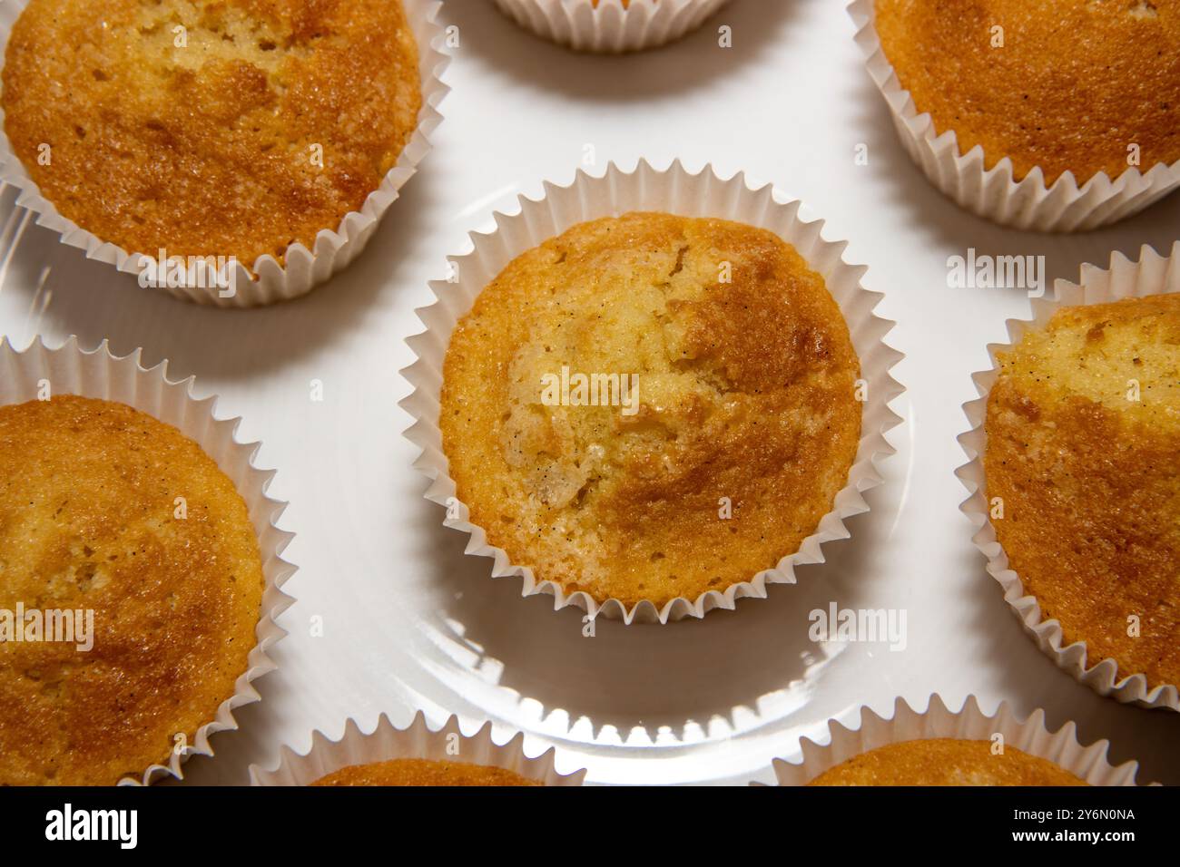 Straight down photo of plate of classic British baked buns on white ...