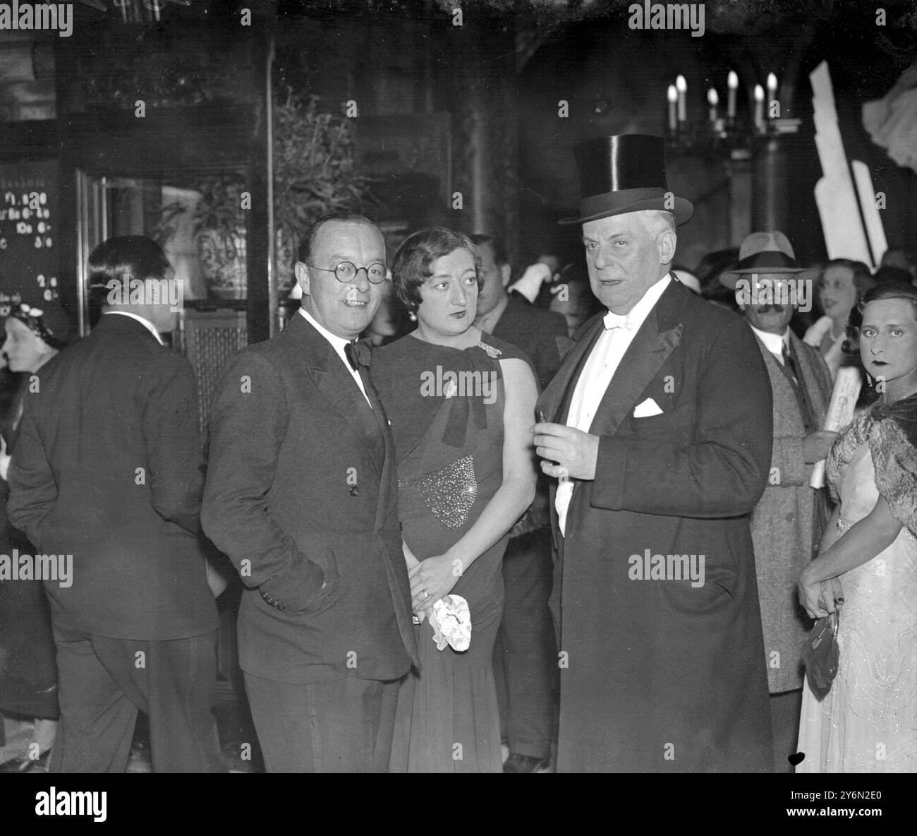 Left to right - Leslie Henson, the famous actor, with Mrs. Henson; and ...