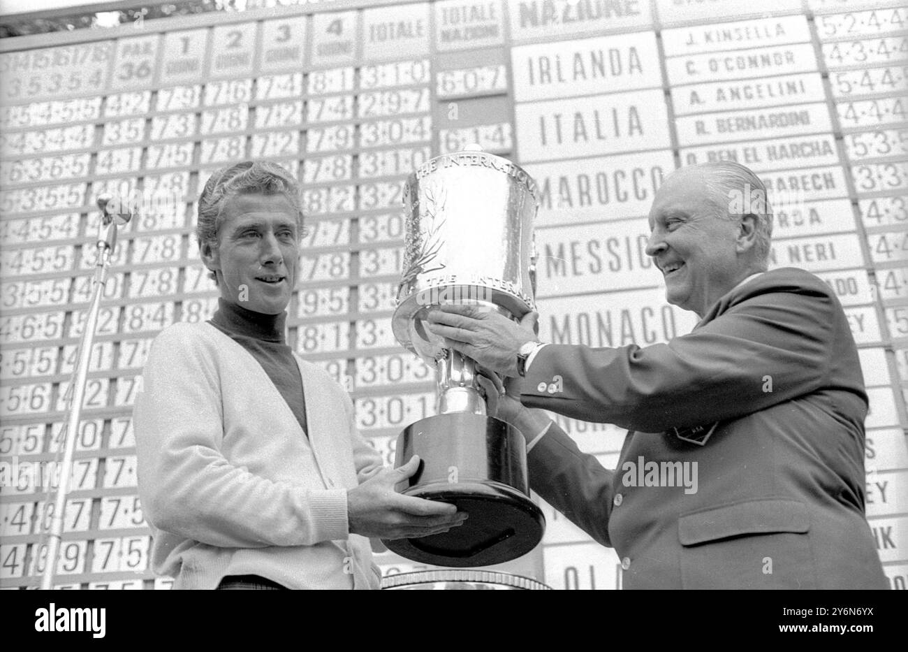 Rome: An unidentified official hands the Tophy to Canadian Al Balding ...