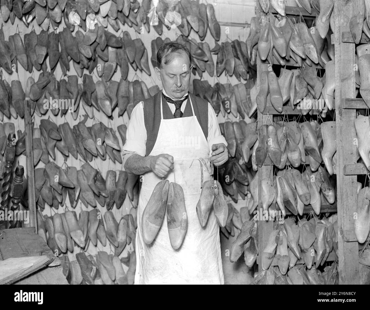 Last and shoe making at W.H. Smith, Sloane Stree. Two models of ladies ...