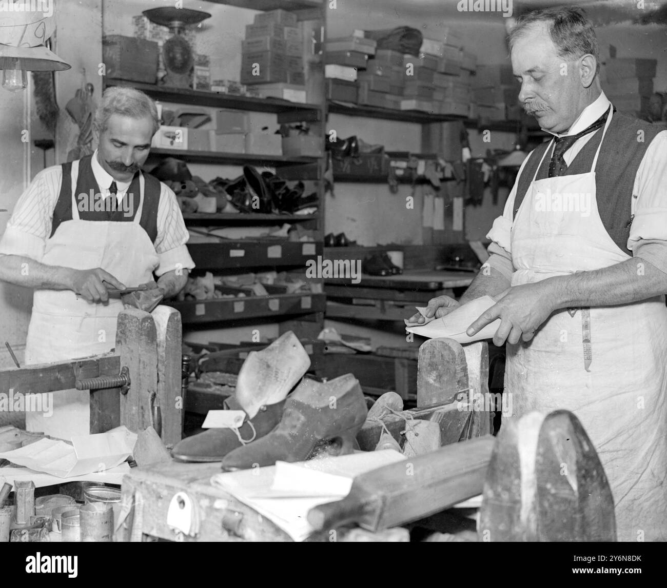 Making of wooden shoe lasts (W. H. Smith, Sloane Street). Smoothing ...