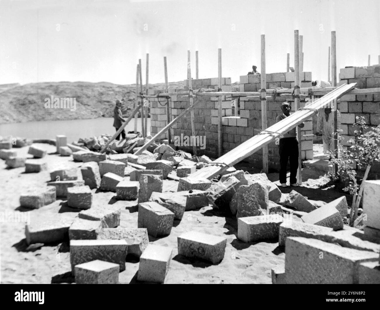 Aswan, United Arab Republic: Workmen construction the laboratory in ...