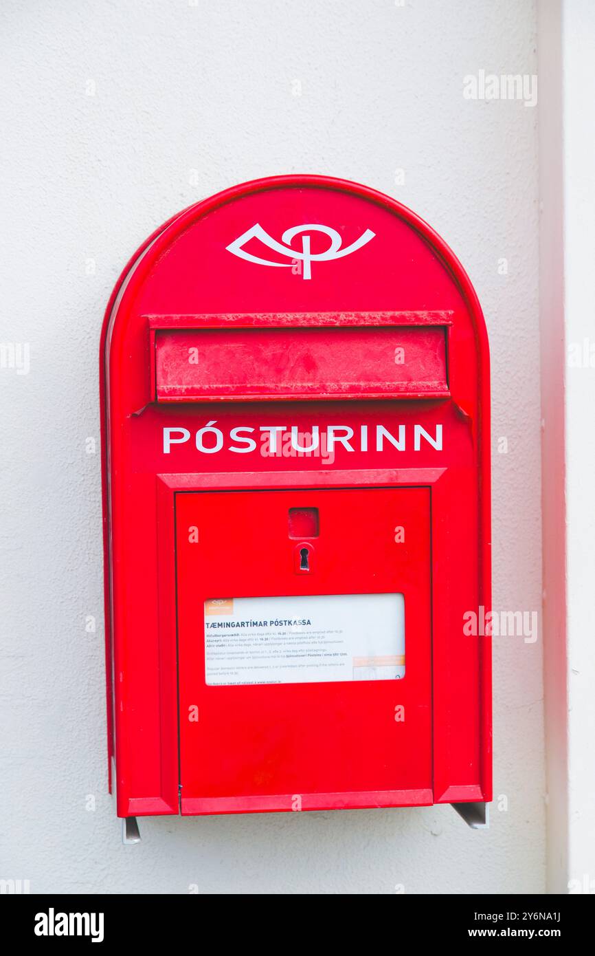 Iceland, Reykjavik, red post office letter box Stock Photo - Alamy