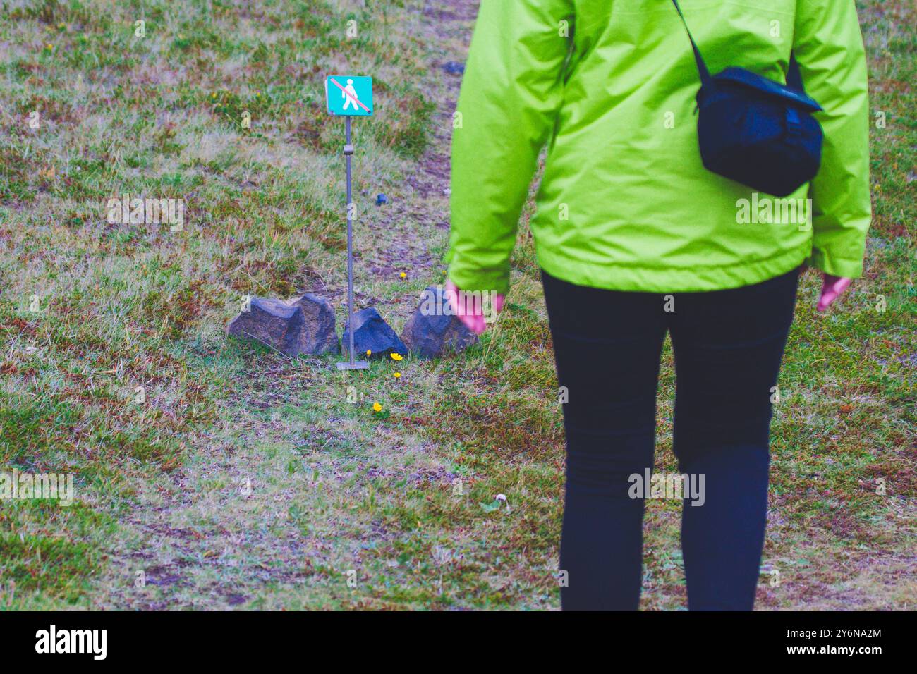 Iceland, small closed path with a few stones and a small prohibition ...