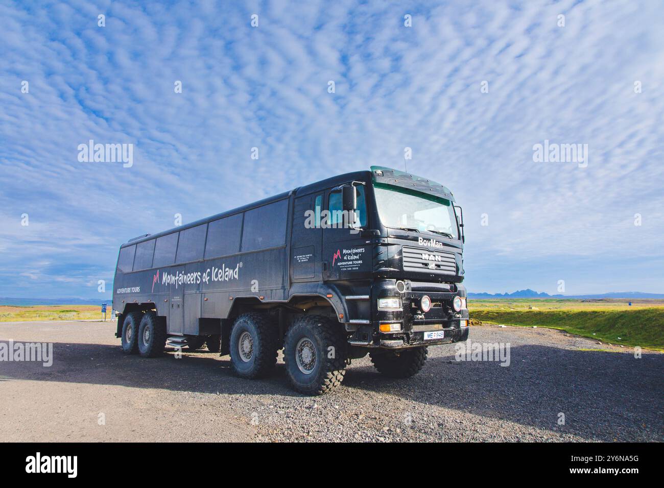 Man 8x8 all-terrain vehicle for touring Iceland Stock Photo - Alamy