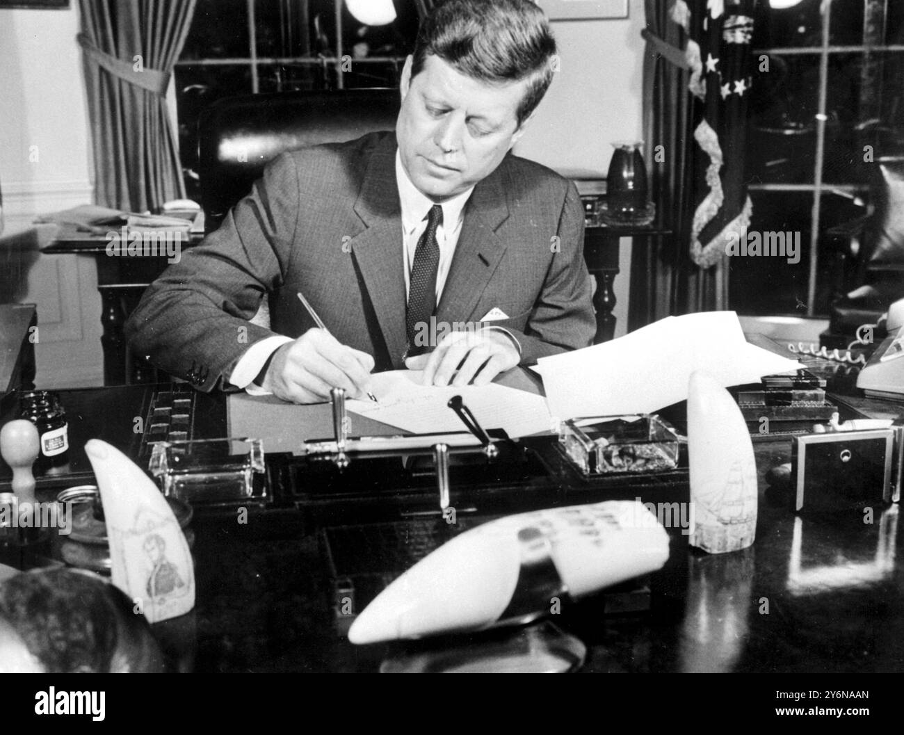 Signing for a delivery Black and White Stock Photos & Images - Alamy
