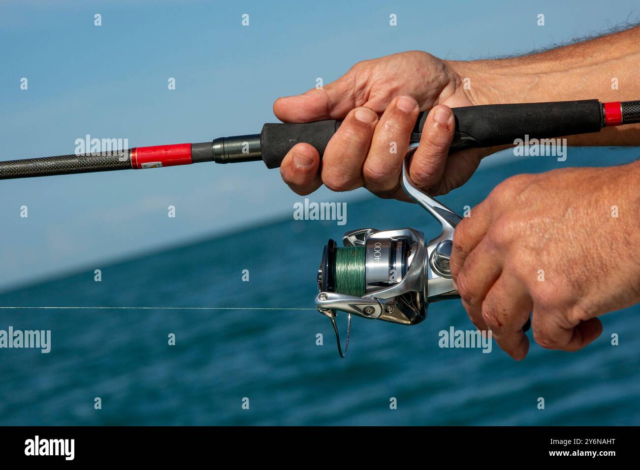 Fisherman fishing rod close up hi-res stock photography and images - Alamy