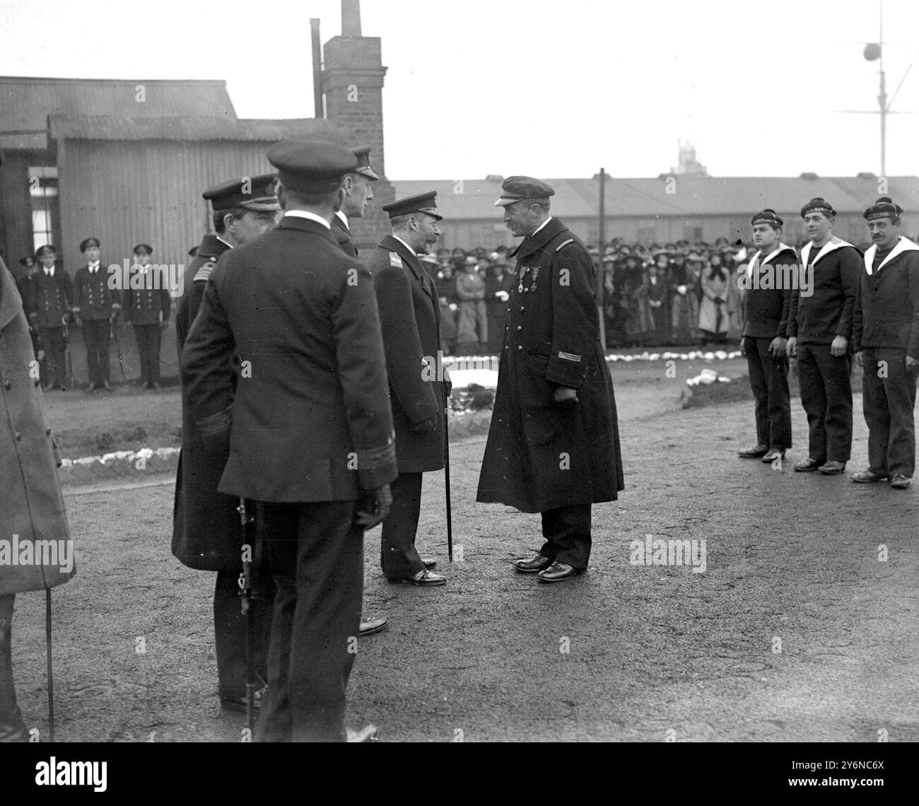Royal visit to Immingham Docks. His Majesty talking to Commander De ...
