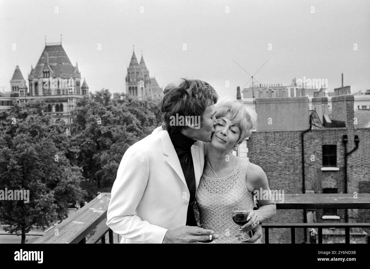 London: Pop singer Billy Fury with his fiances Judith Hall, a 29 year ...