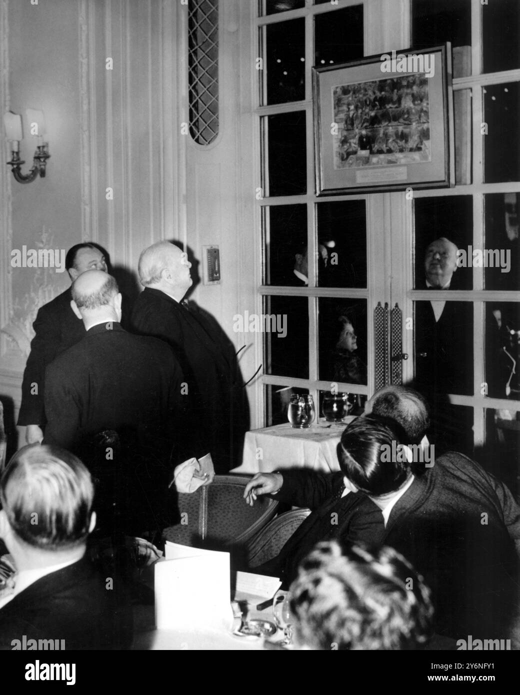 Winston Churchill studies a watercolour by EA showing the front bench ...