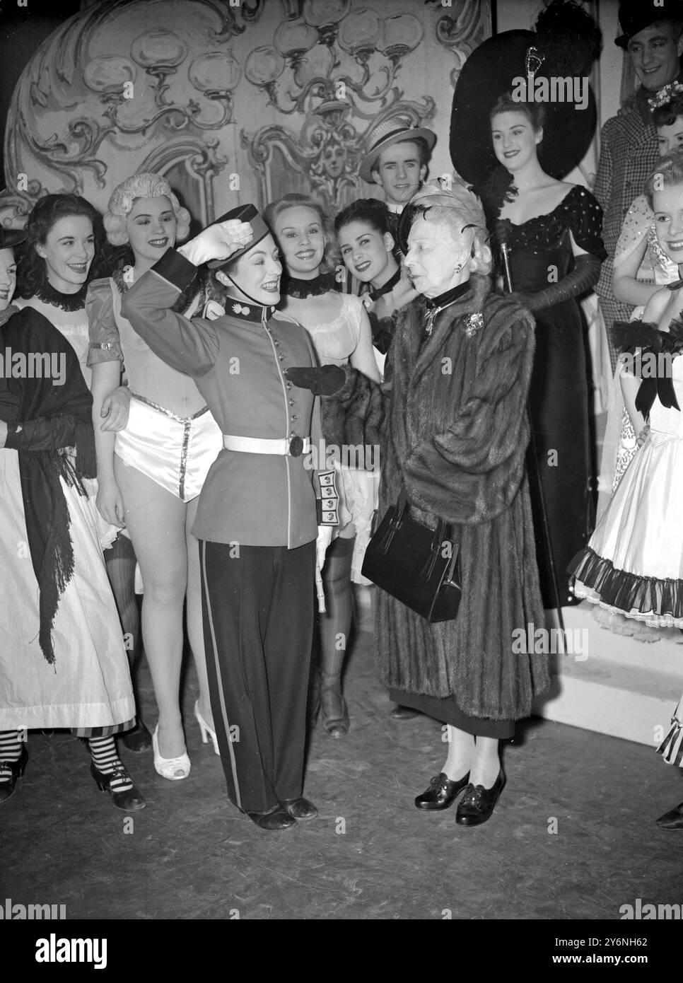 Windmill Theatre "Star" Marilyn Lynde comes up to a snappy salute as ...