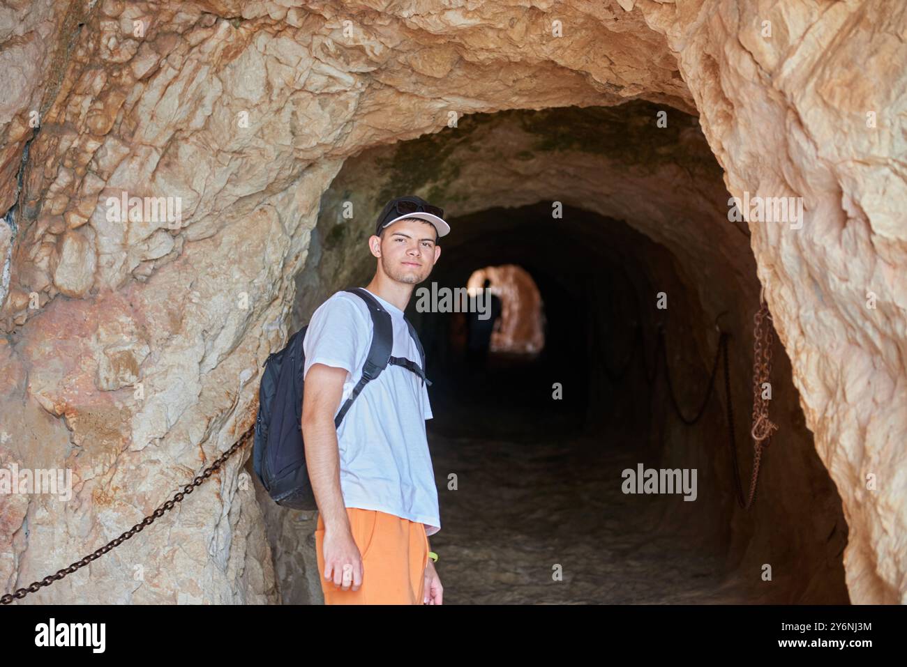 Intrepid Male Traveler Discovers Ancient Rock Tunnel Amidst ...