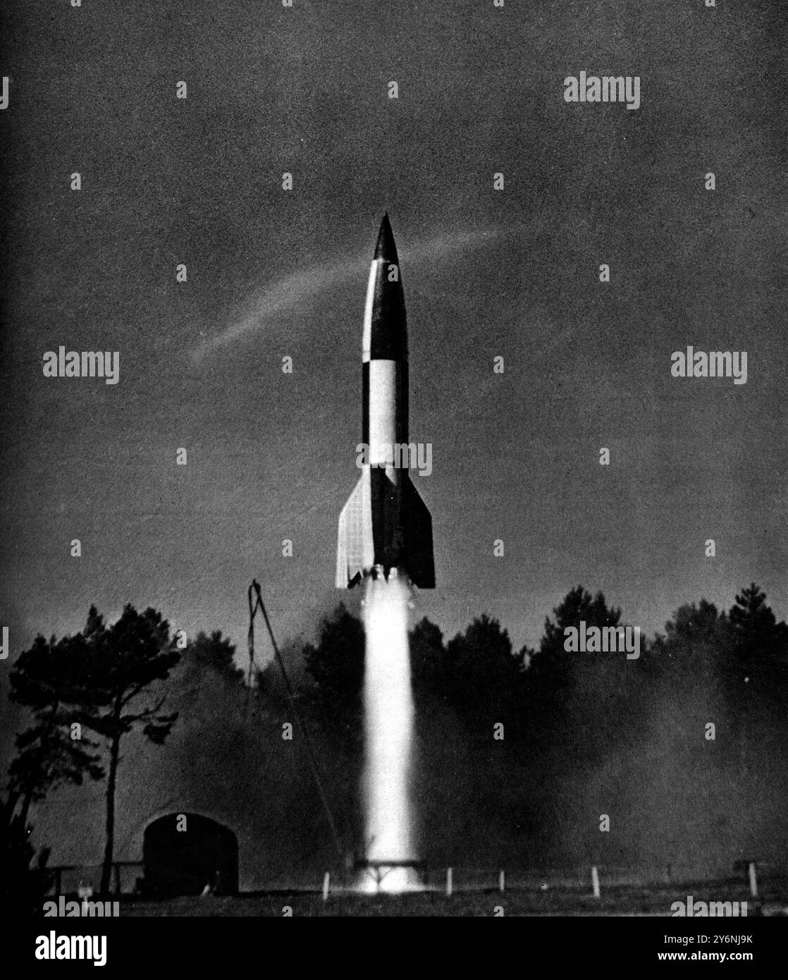 A British fired V2 rocket bomb streaking up from an experimental ...