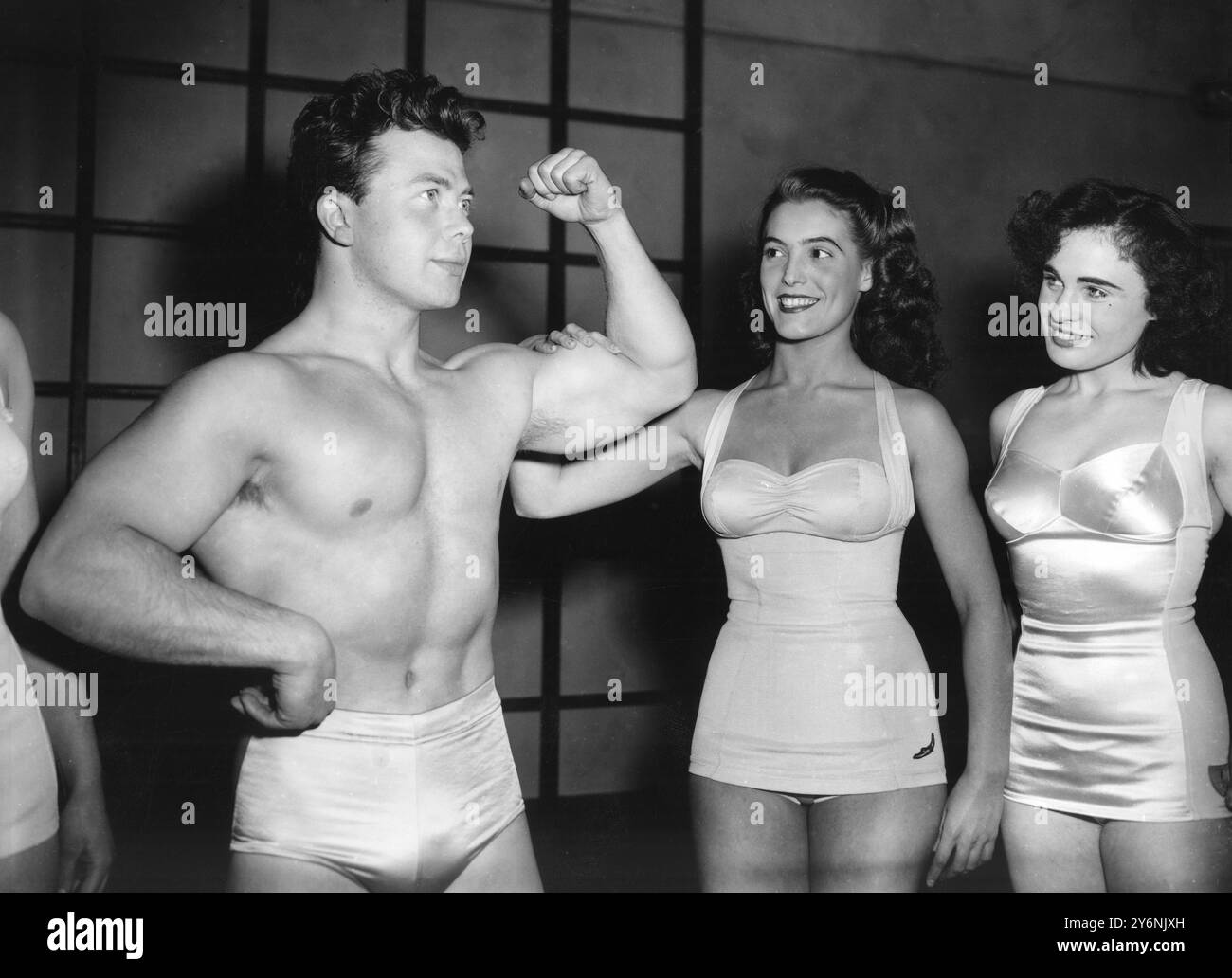 Wally Wright as Mr Britain is admired by Hazel Cleaver 1954 Stock Photo - Alamy