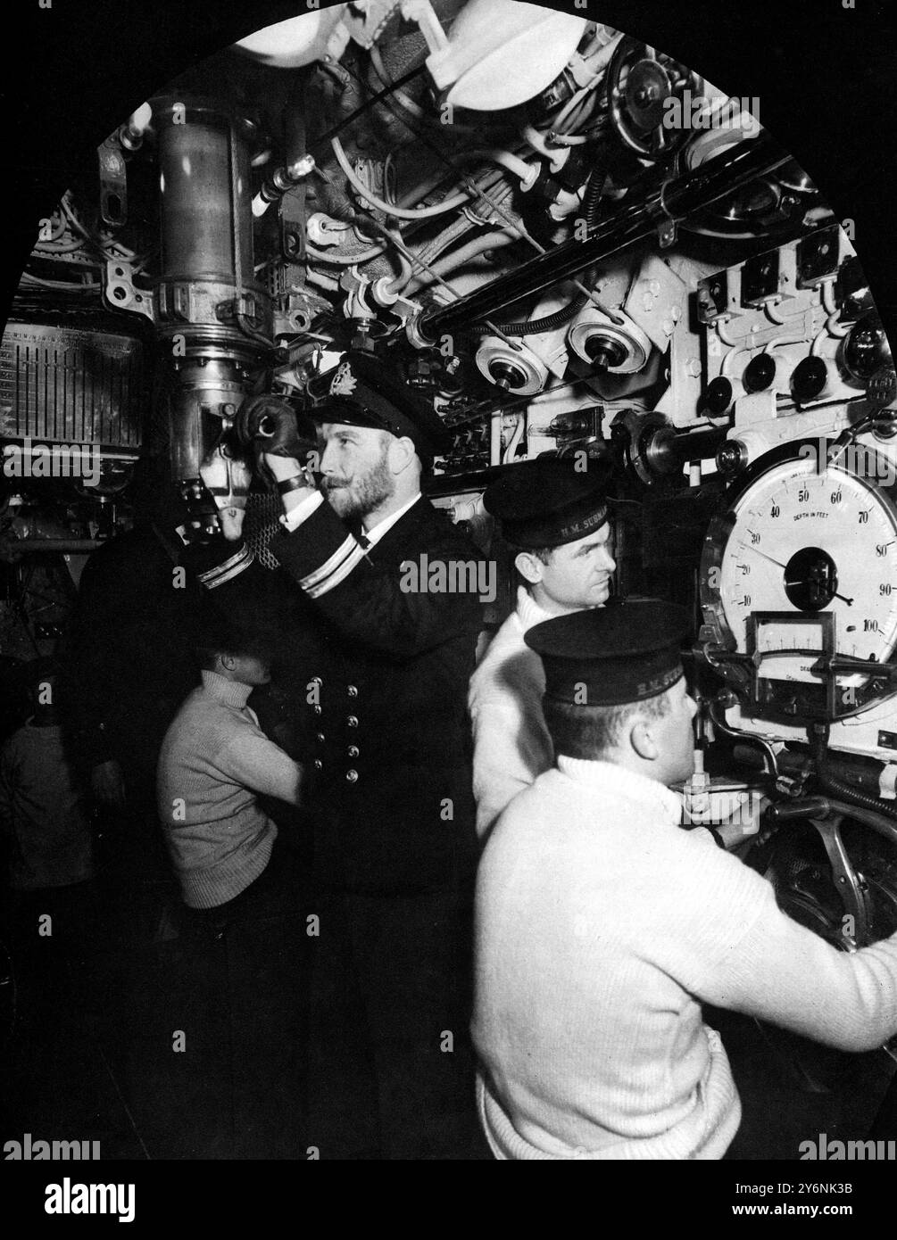 Preparing for attack, a submarine manoeuvring for position The brain of ...