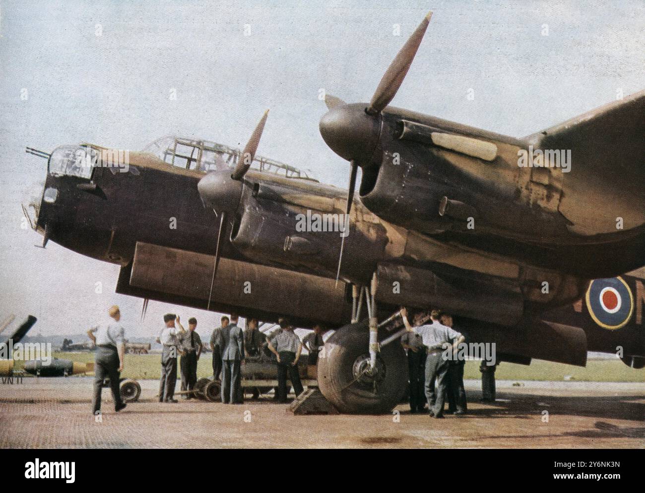 The huge dimensions of the 'Lancaster' shown during bombing up. Th ...