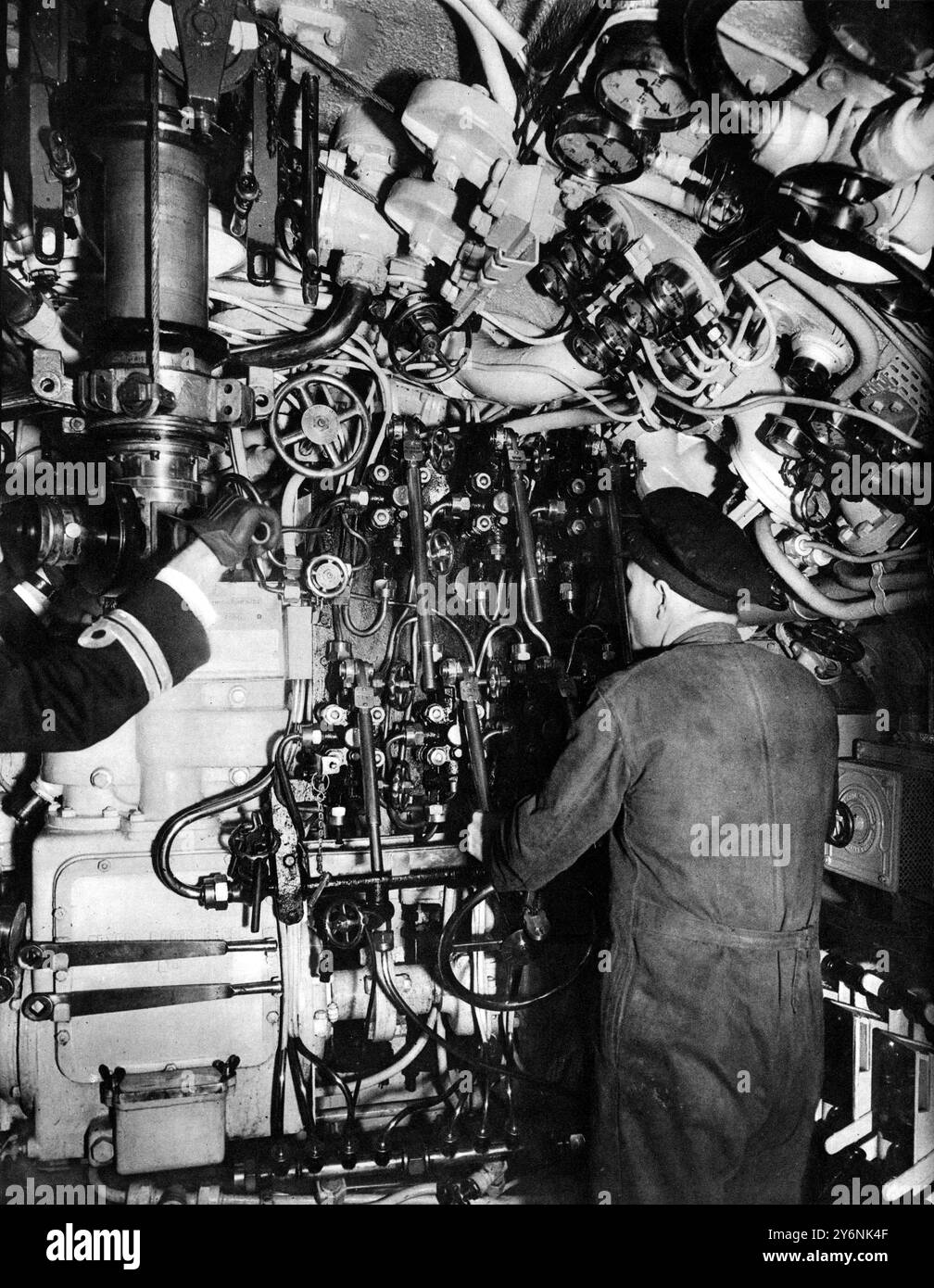 The control room of a submarine. Cruising below the surface, the engine ...