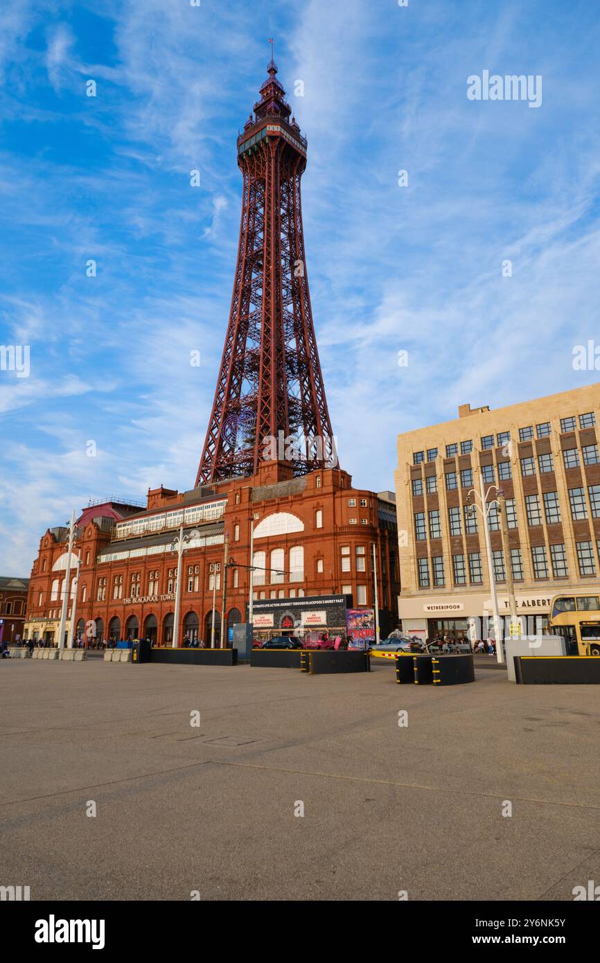 Iconic Blackpool Tower and surrounding architecture under a clear blue ...