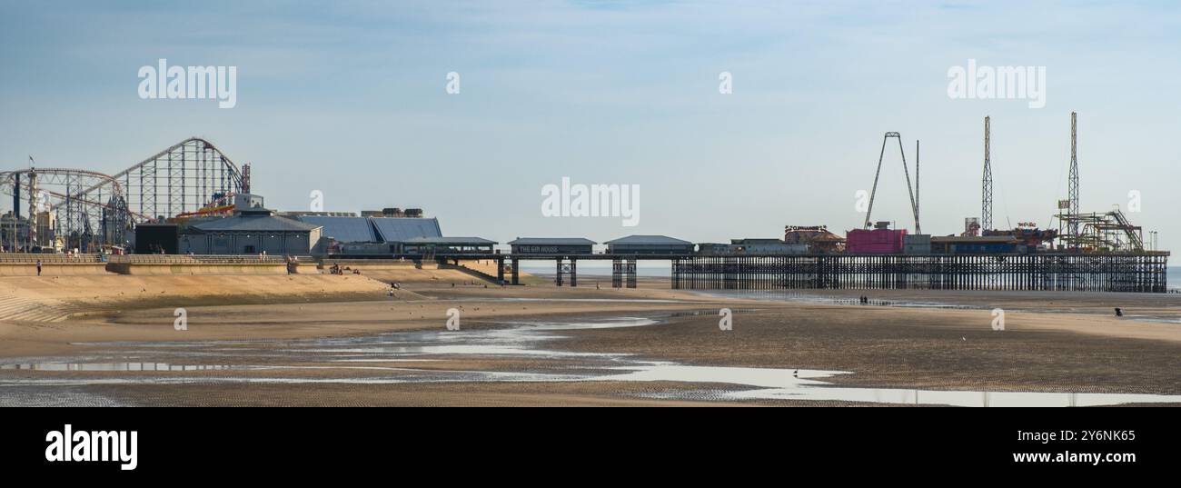 Serene beachfront with an amusement park pier, showcasing a ...