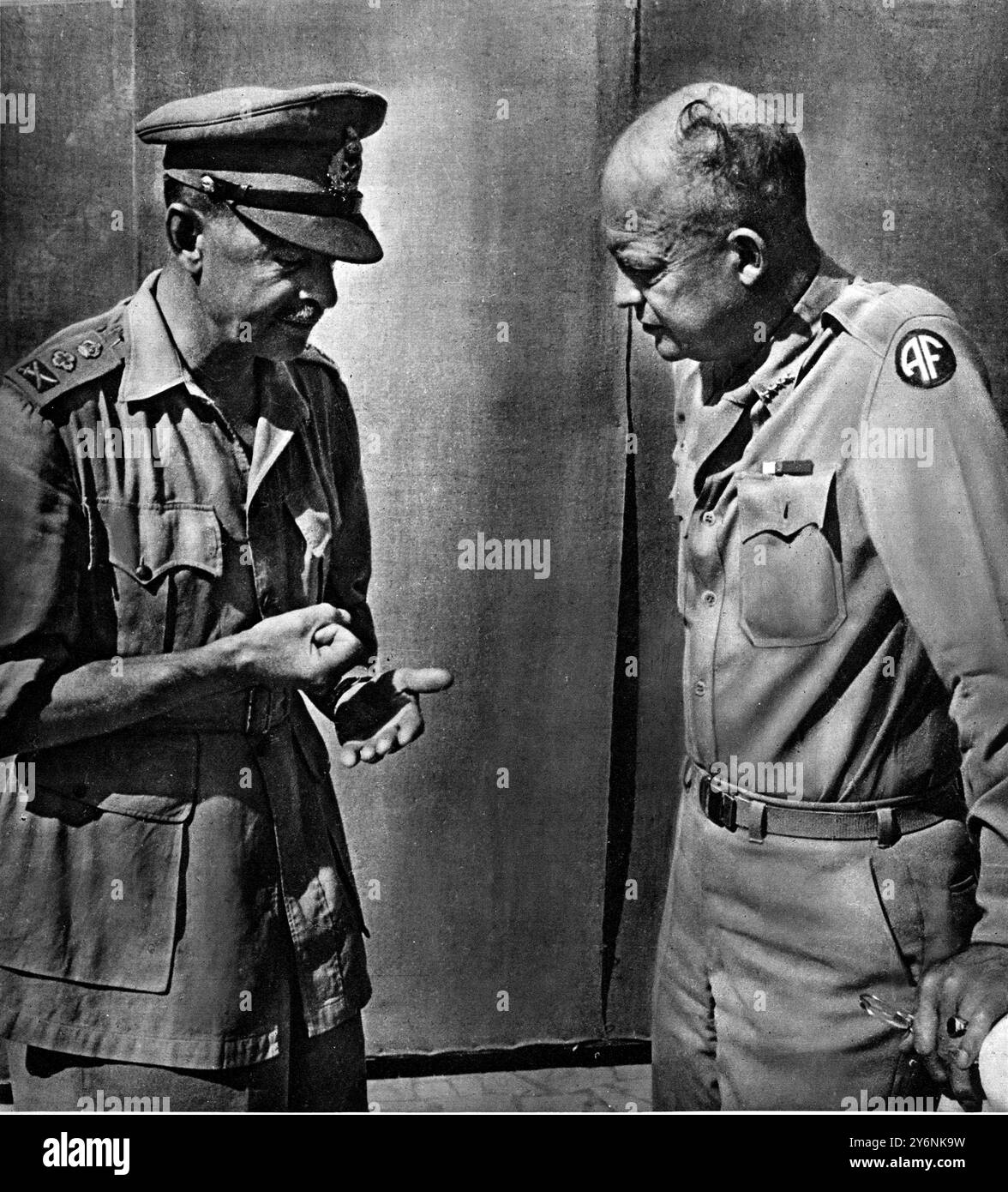 The meeting of great Commanders: General Eisenhower (right) in serious ...