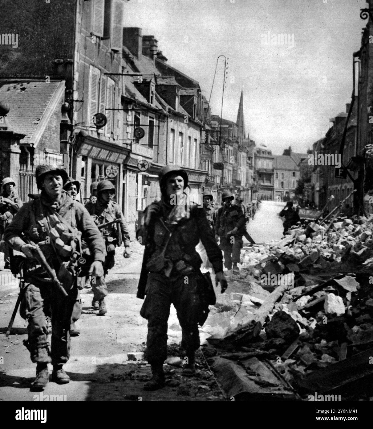 American troops entering Carentan after its capture on June 12th 1944 ...