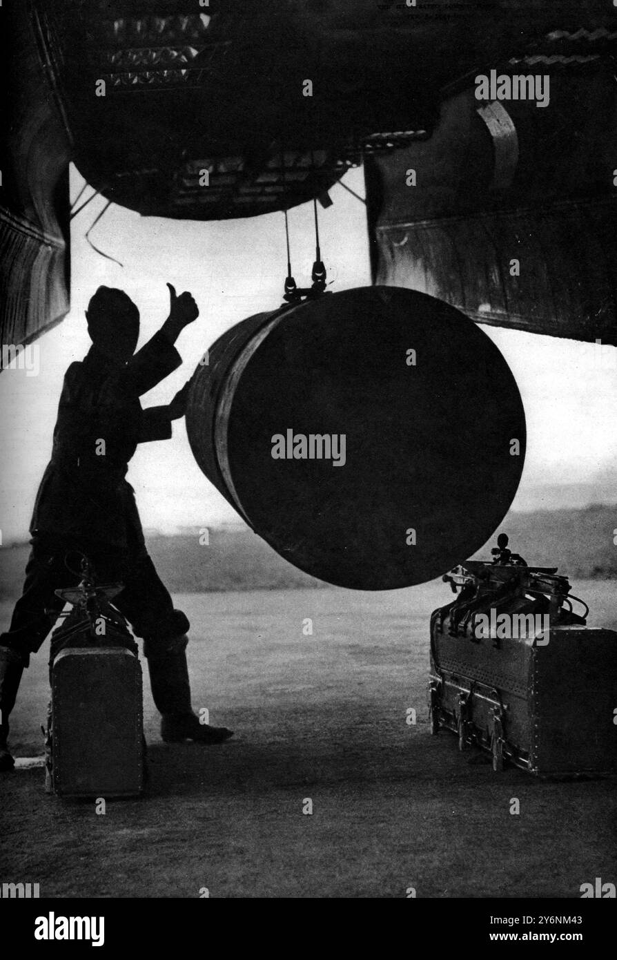 Silhouette of a 'Cookie', a 4000 lb bomb joining racks of incendiaries ...
