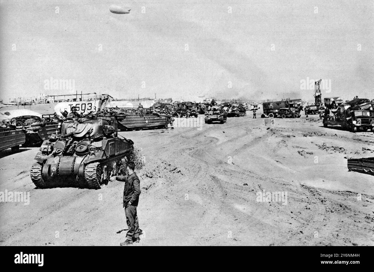 Early invasion scenes on the shores of Normandy, landing troops and ...