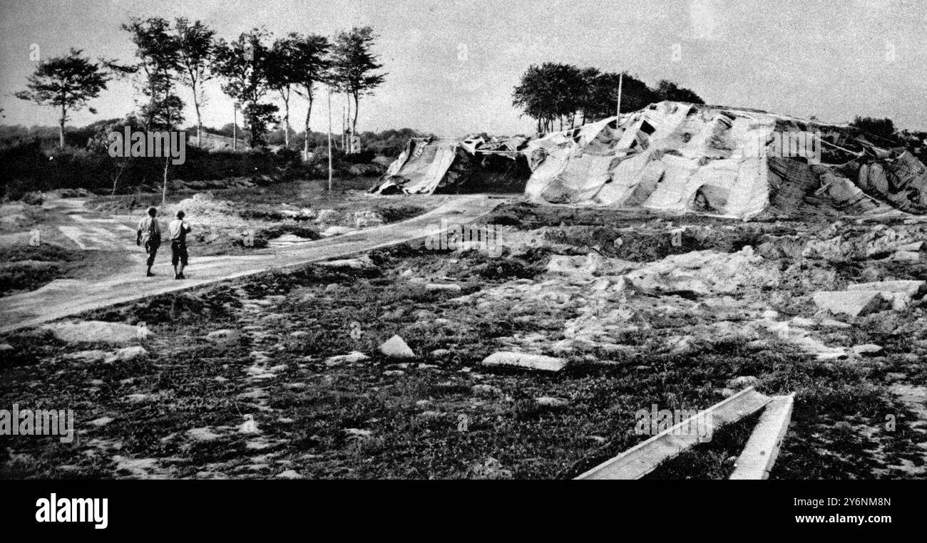The extensively camouflaged control building of one of the captured ...