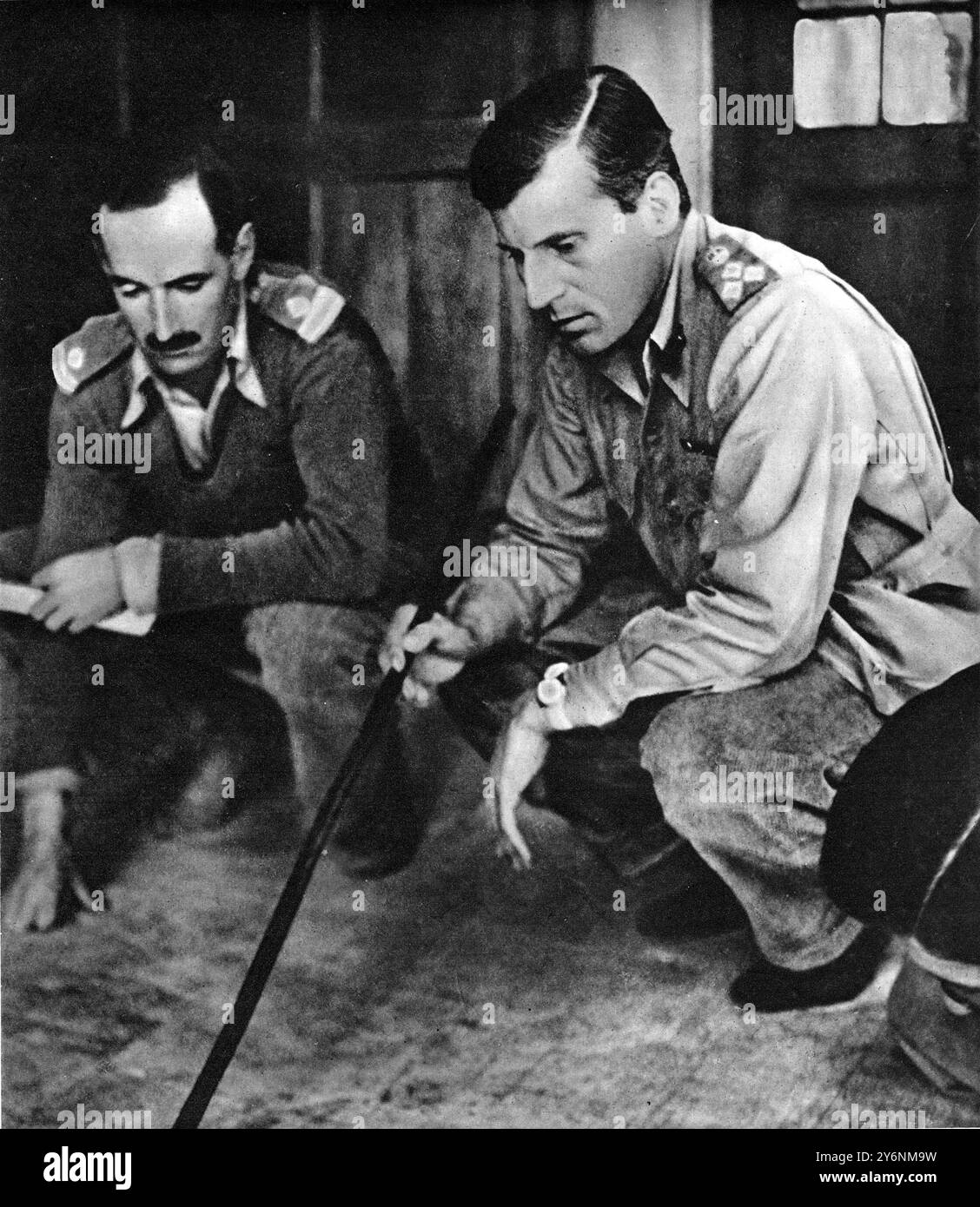 A modern Buccaneer: Brigadier Wingate, with pointer, makes final plans ...