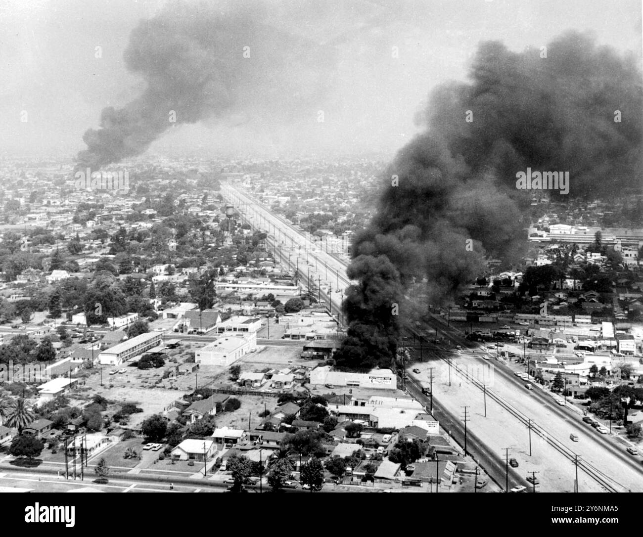 Los Angeles, California: Thick black smoke engulfs the Watts area ...