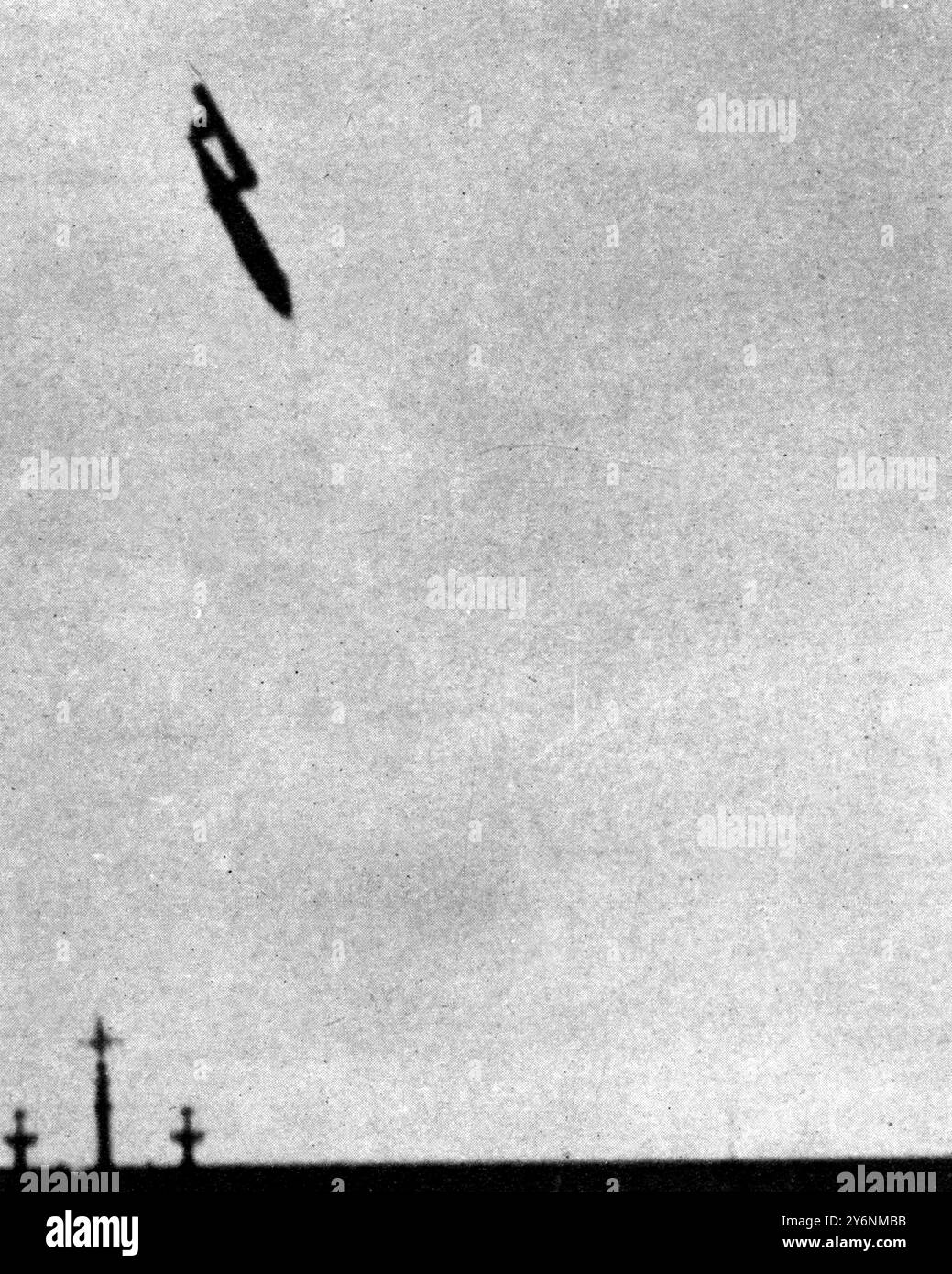 A flying bomb diving after its motor had cut out. Seconds later it ...