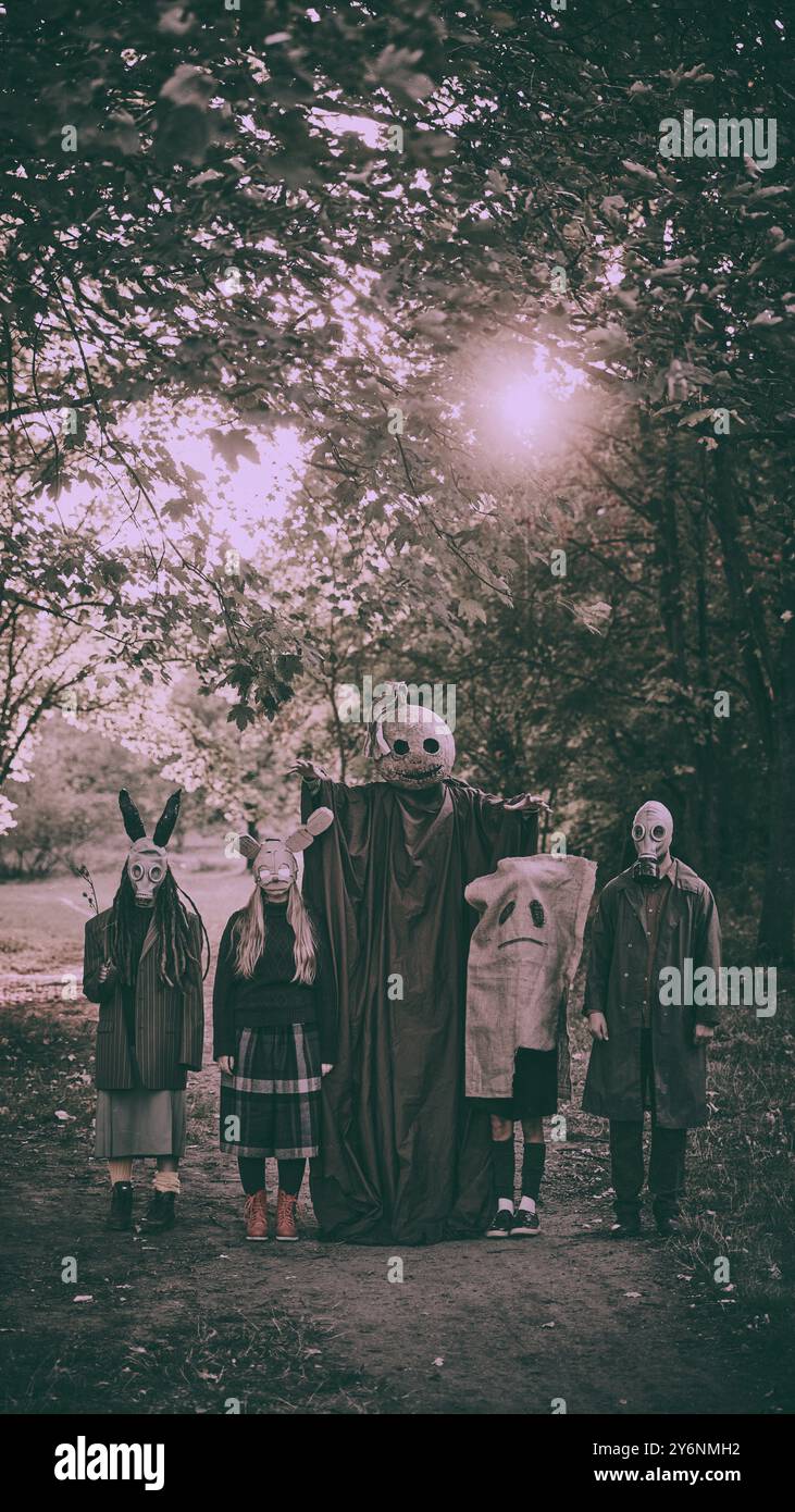 Tall figure with round mask standing alongside creepy figures in odd ...