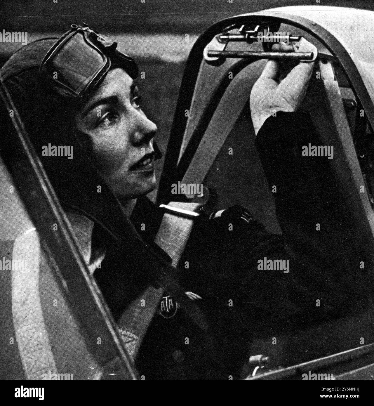 First officer Helen Richey demonstrates the working of a bullet proof ...