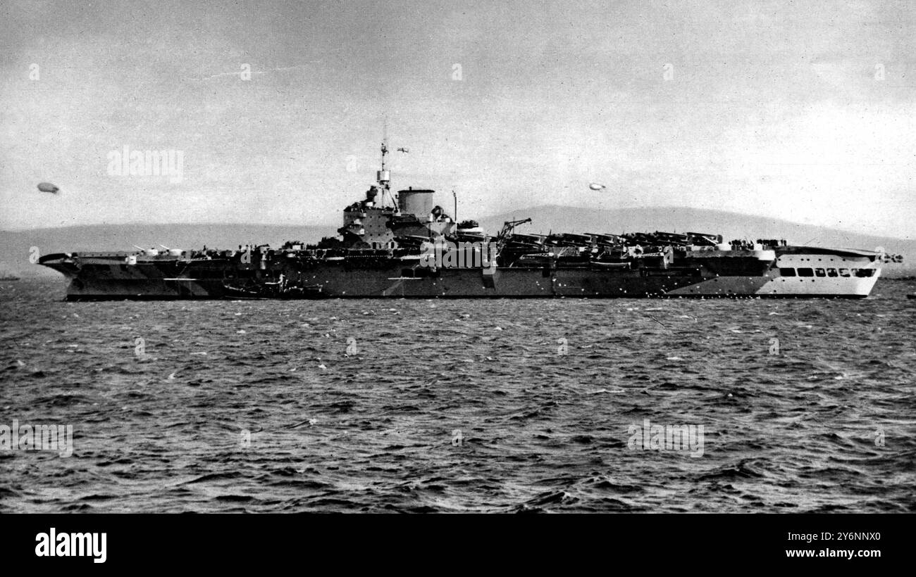 Aircraft carrier HMS Victorious at anchor, planes from which played so ...