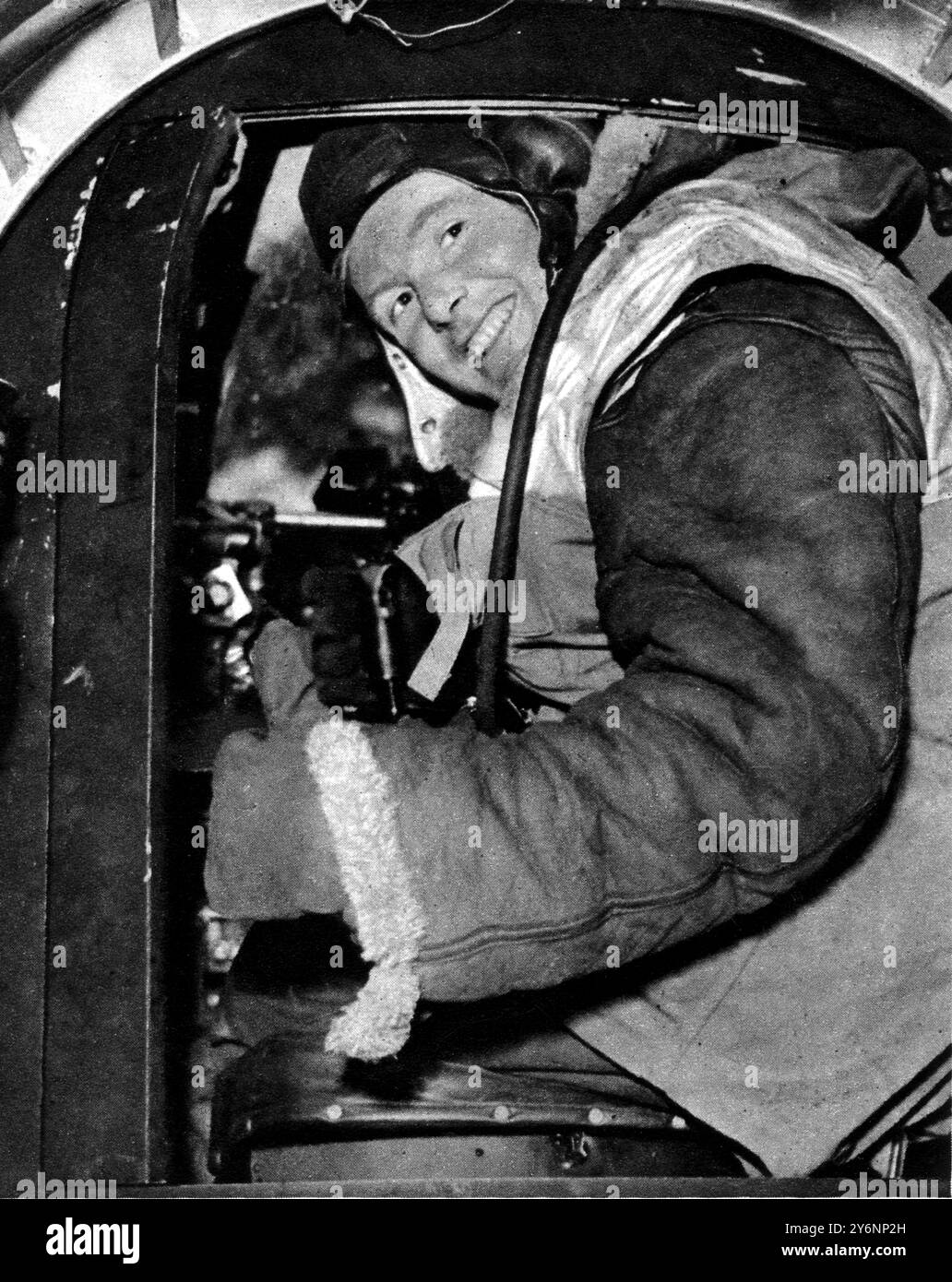 The tail end charlie of a Halifax gives the thumbs up sign just before ...