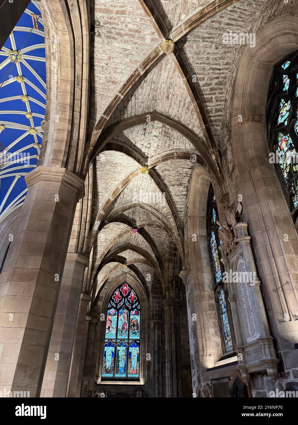 The interior view of Edinburgh cathedral with vaulted ceilings and ...