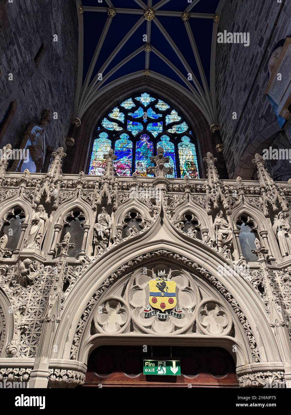 The intricate Gothic architecture with stained glass windows inside ...